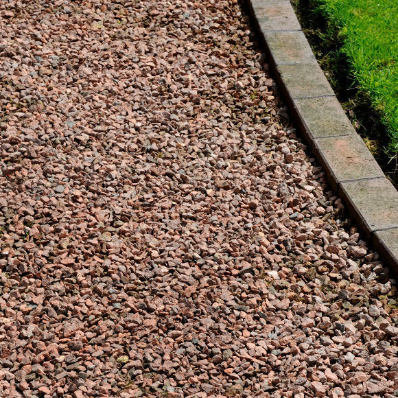 Bulk bag red granite 10-20mm Chippings | Rose Building Supplies